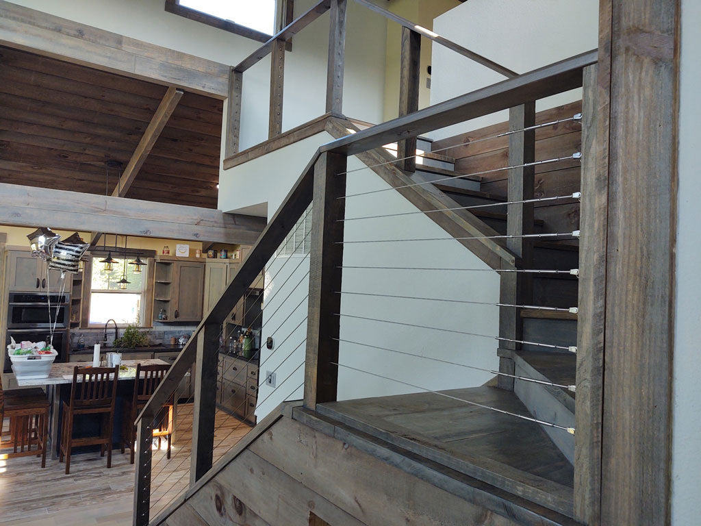 Modern Cable Deck Railing with Wood Posts by Muzata
